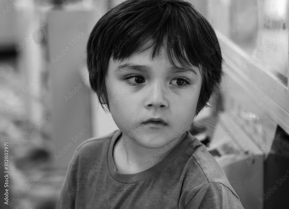 Emotional black and white photo of kid sad face looking deep in ...