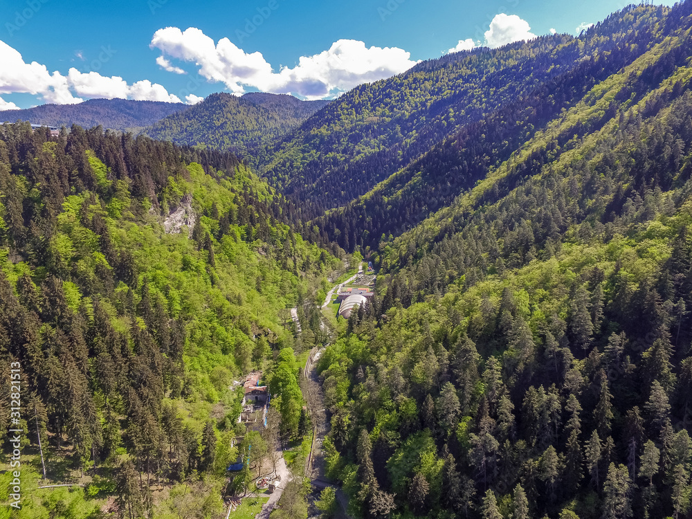 great waterfall and forest view from funicular transport in Borjomi ...