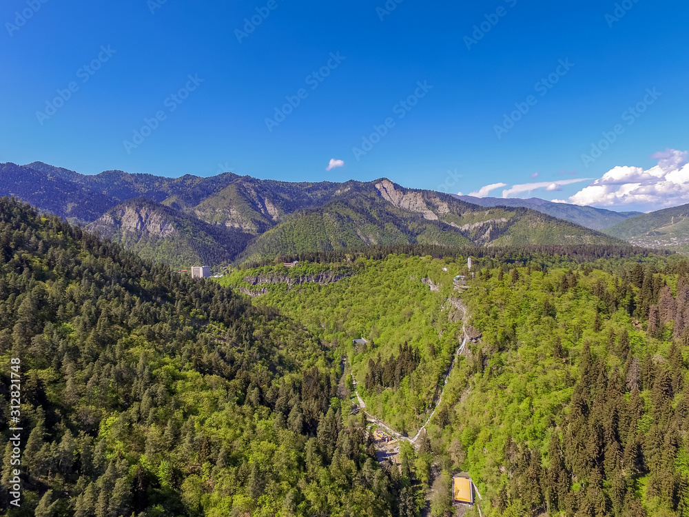 great waterfall and forest view from funicular transport in Borjomi ...