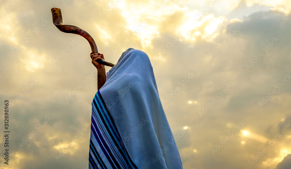 Jewish man in a tallith prayer shawl against dramatic sky Stock Photo ...