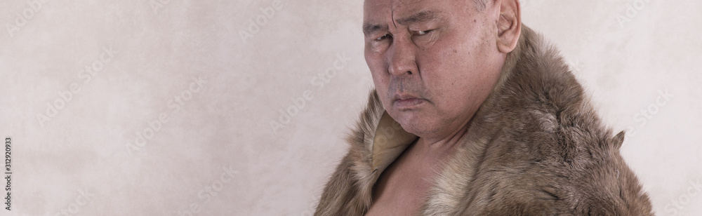 ancient caveman in the skin and with a club Stock Photo | Adobe Stock