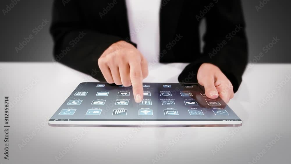 Businesswoman using a futuristic tablet. Financial. Financial diagram ...