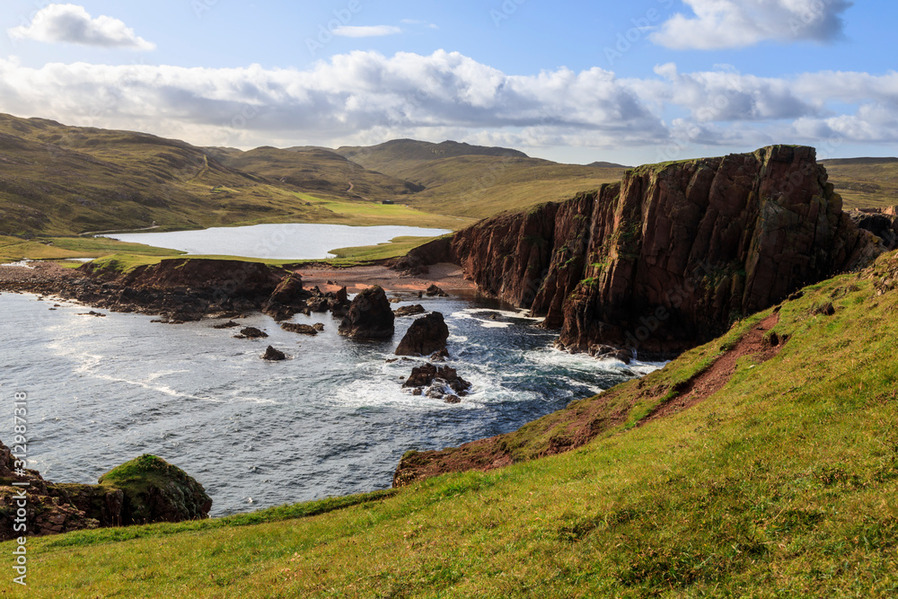 North Ham Bay, deep inlet, elevated view, red granite cliffs, stacks ...