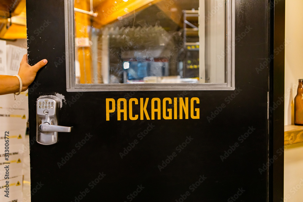 packaging yellow vinyl sticker text Information sign, hand on open ...