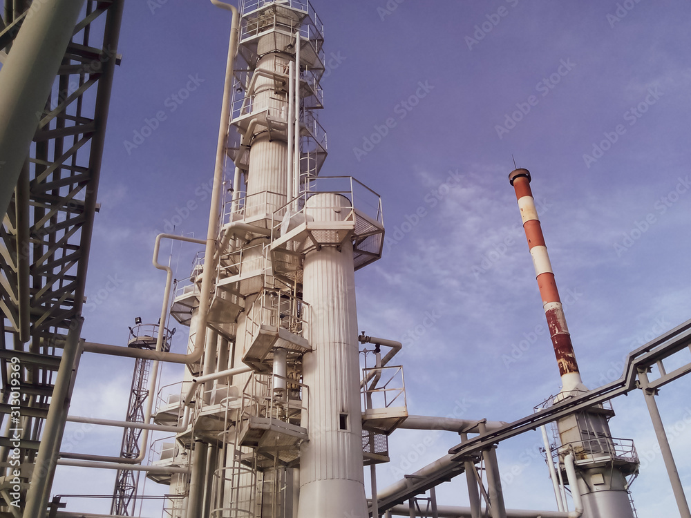 Distillation columns and heating furnace Stock Photo | Adobe Stock