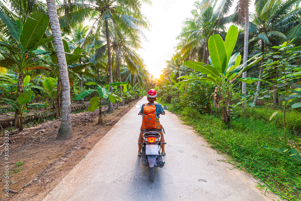One person riding bike in the Mekong Delta region, Ben Tre, South ...