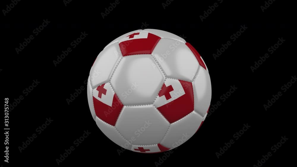 Tonga flag on a flying and rotating soccer ball on a transparent ...