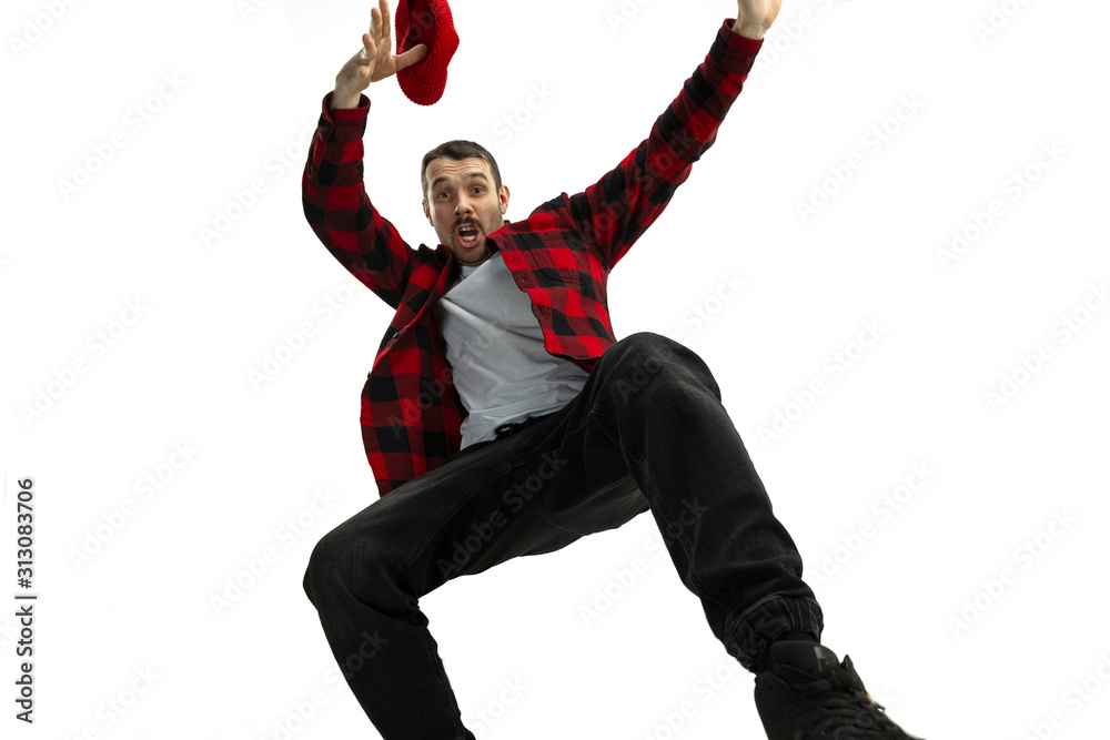 A second before falling. Caucasian young man falling down in moment ...