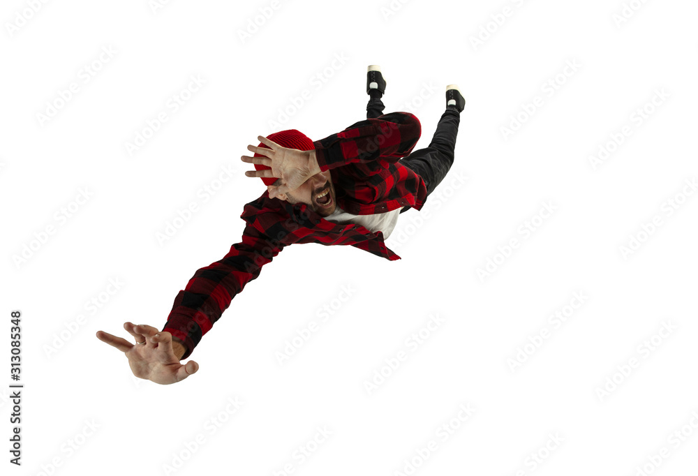 A second before falling. Caucasian young man falling down in moment ...