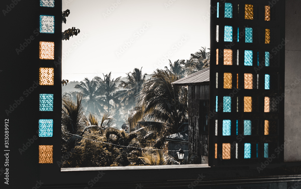 Old wooden Filipino house with Spanish style stained glass window Stock ...