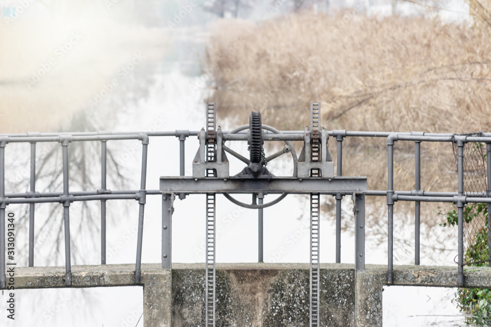 mechanism for opening and closing the water channel gate Stock Photo ...