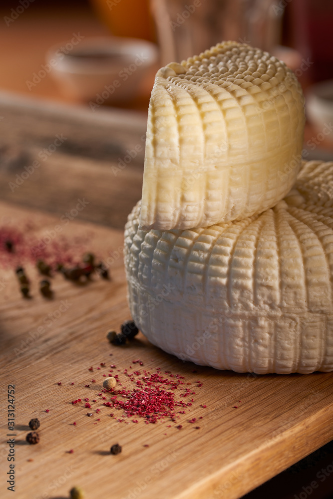 Сloseup of round white homemade soft cheese - traditional milk creamy ...