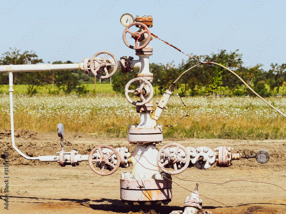 Well for oil and gas production. Oil well wellhead equipment. Oil ...