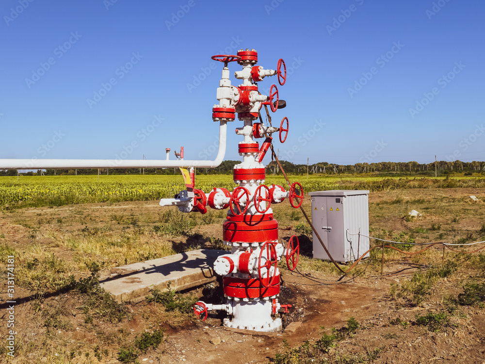 Well for oil and gas production. Oil well wellhead equipment. Oil ...