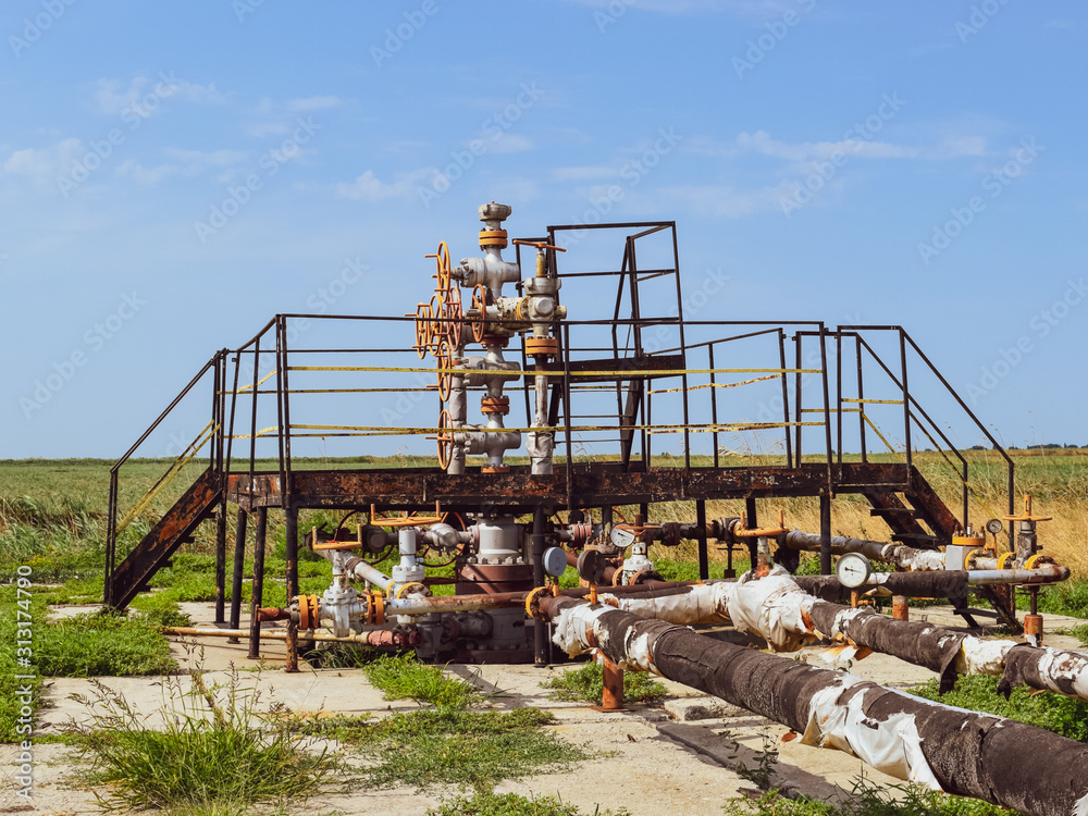 Well for oil and gas production. Oil well wellhead equipment. Oil ...