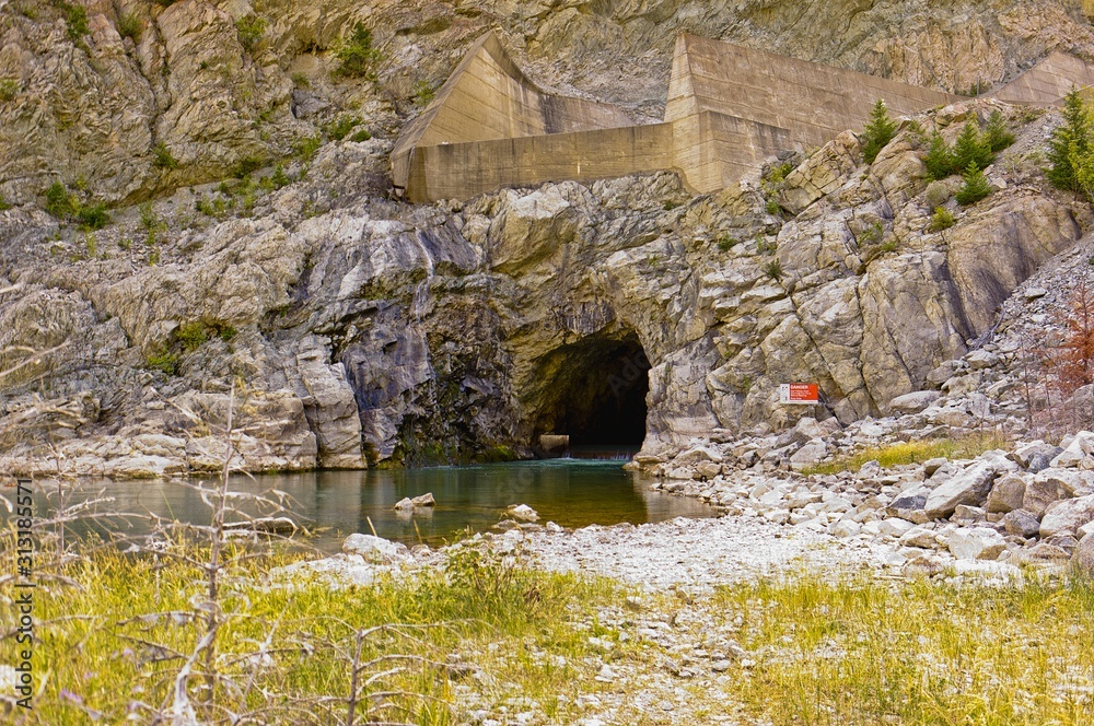 Hydro dam spillway and bypass tunnel Stock Photo | Adobe Stock