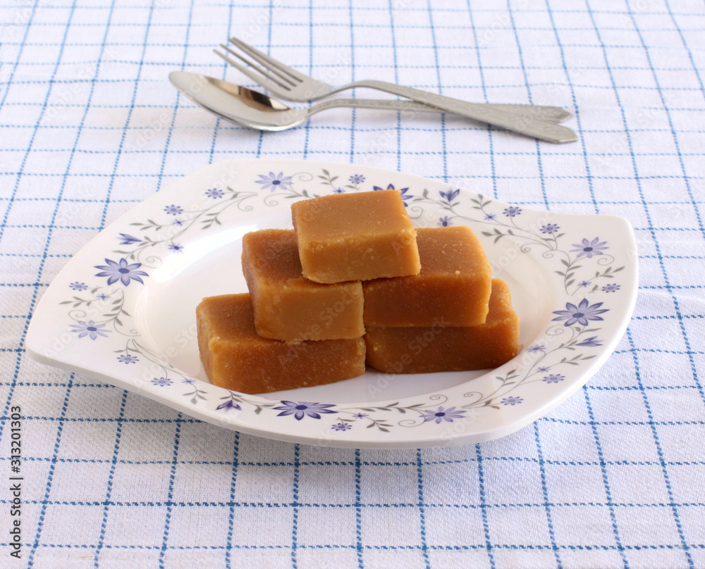 Mysore pak, a traditional, popular, and delicious sweet dish native to ...