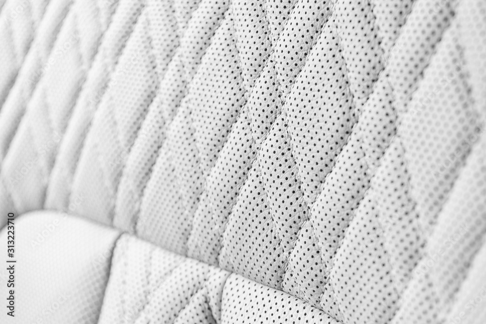 Modern luxury Car white leather interior. Part of perforated leather ...