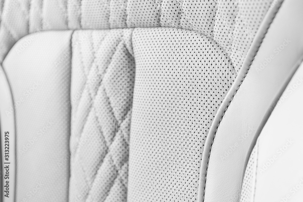 Modern luxury Car white leather interior. Part of perforated leather ...