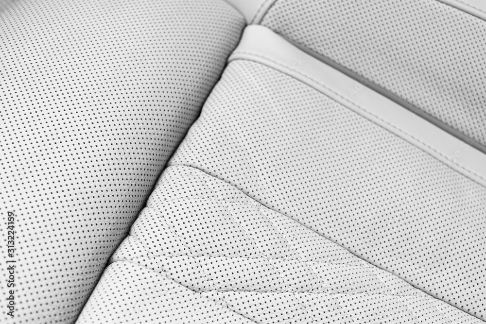 Modern luxury Car white leather interior. Part of perforated leather ...