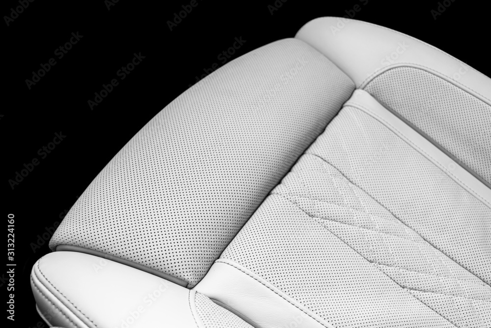 Modern luxury Car white leather interior. Part of perforated leather ...