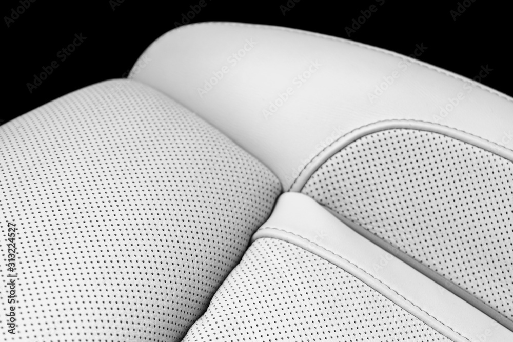 Modern luxury Car white leather interior. Part of perforated leather ...
