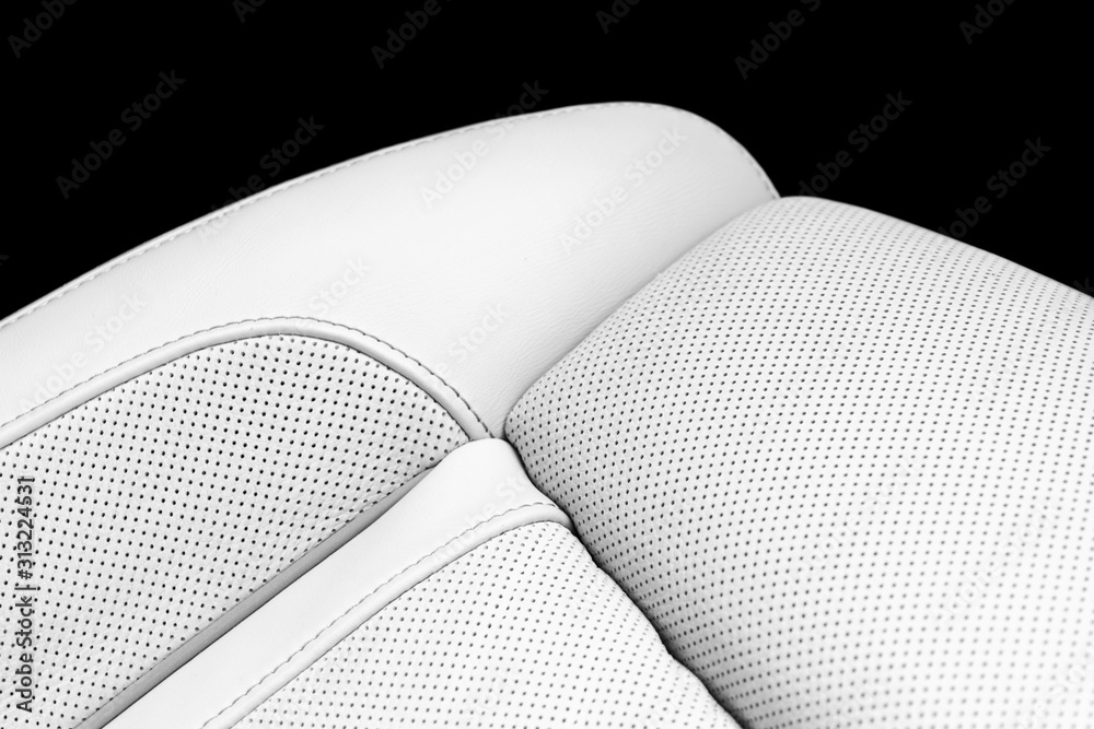 Modern luxury Car white leather interior. Part of perforated leather ...