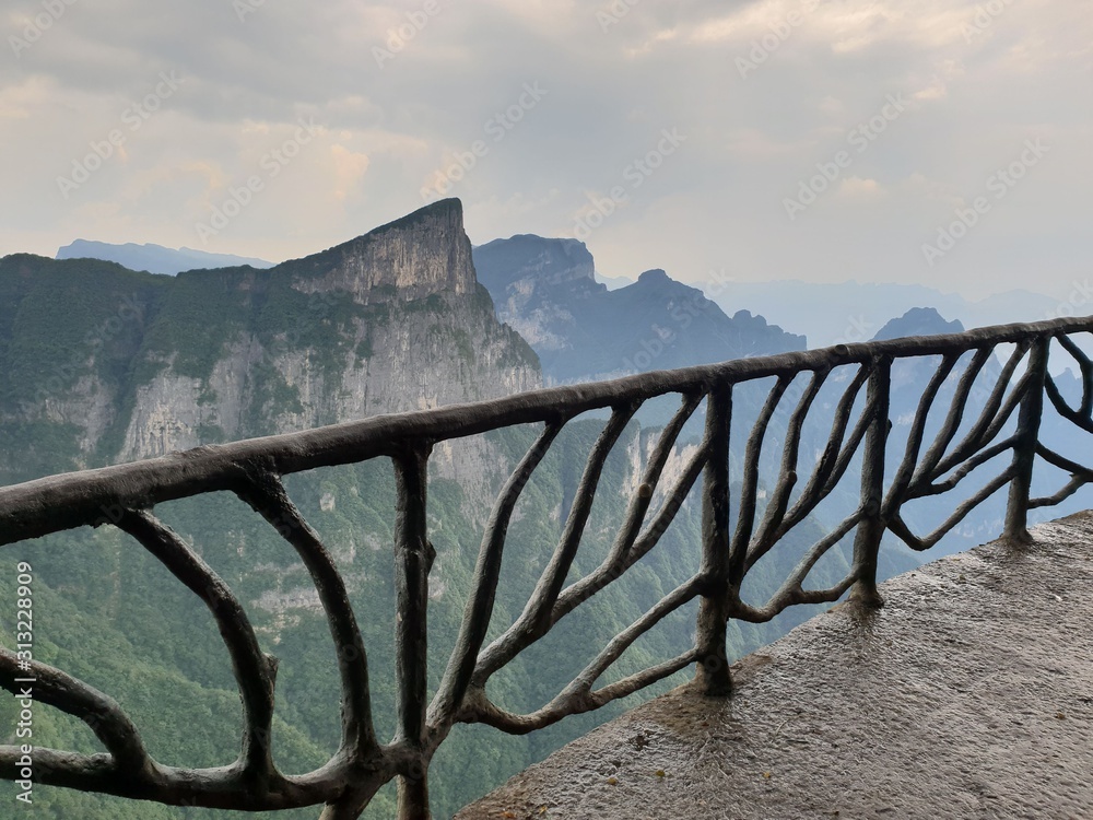 Tianmen Mountain Known as The Heaven`s Gate surrounded by the green ...