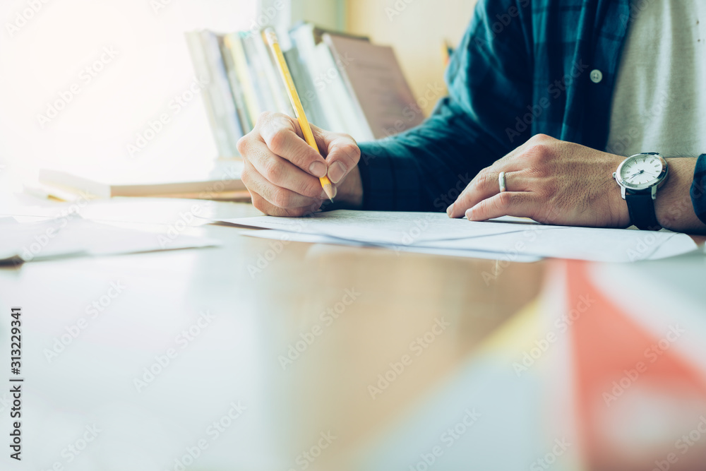 high school,university student study.hands holding pencil writing paper ...