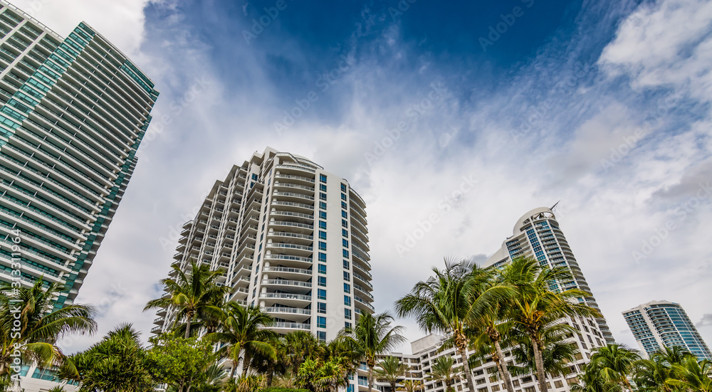 Bottom view of high rise buildings and modern skyscrapers at the ...