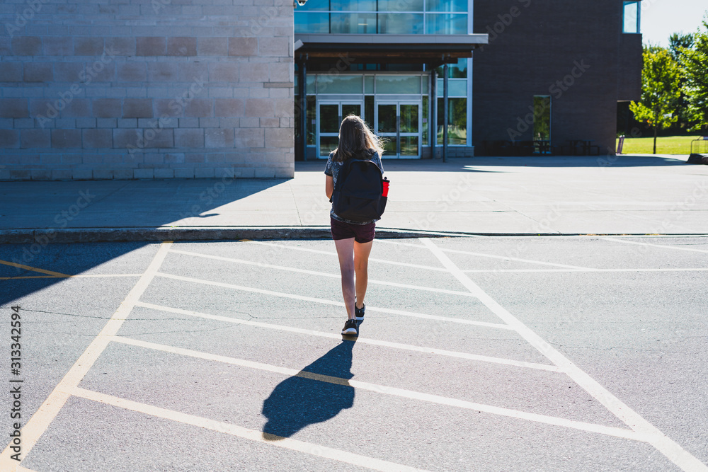 Teen Walking To School