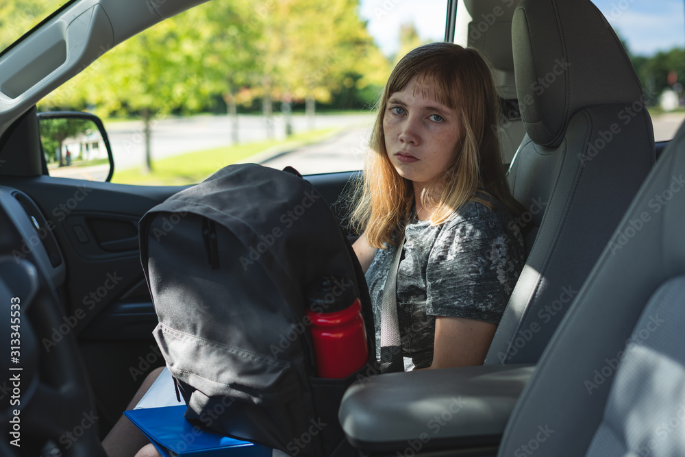 Sad/Depressed teen girl sitting in a car/suv while being driven to ...