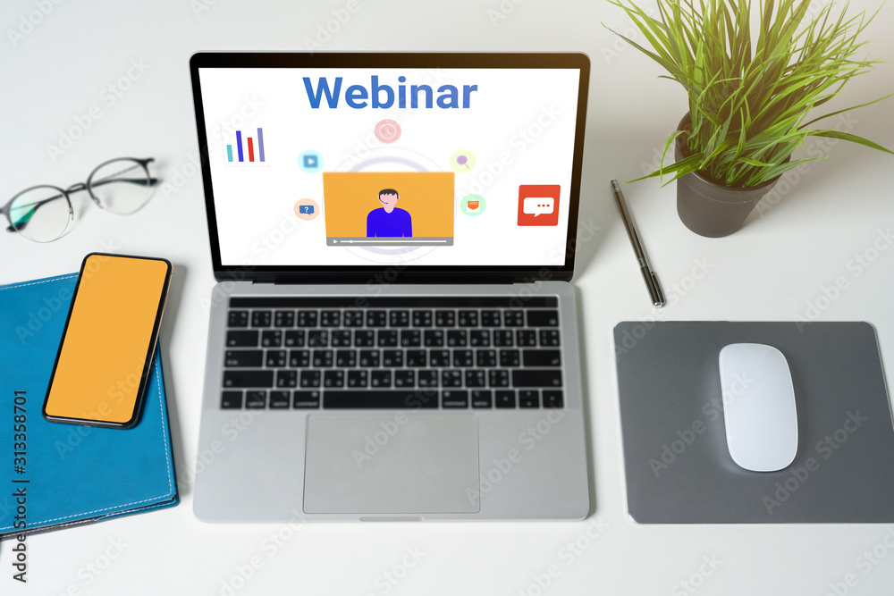 Person using a laptop computer for online training webinars. E-learning ...