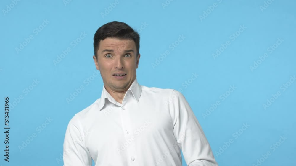 Gross, thats disgusting. Slow-motion handsome adult man cringe as ...