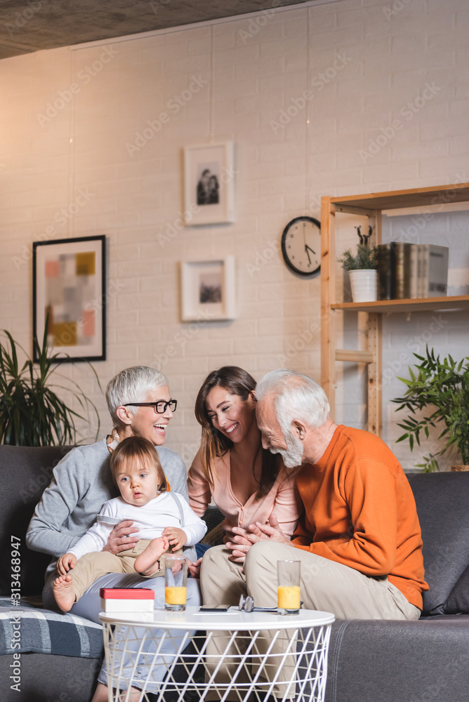 Relaxing at home with family Stock-Foto | Adobe Stock
