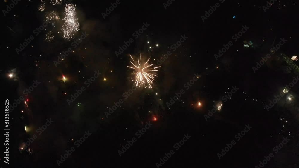 Munich Olympia Park New years eve fireworks from the air flying with a ...