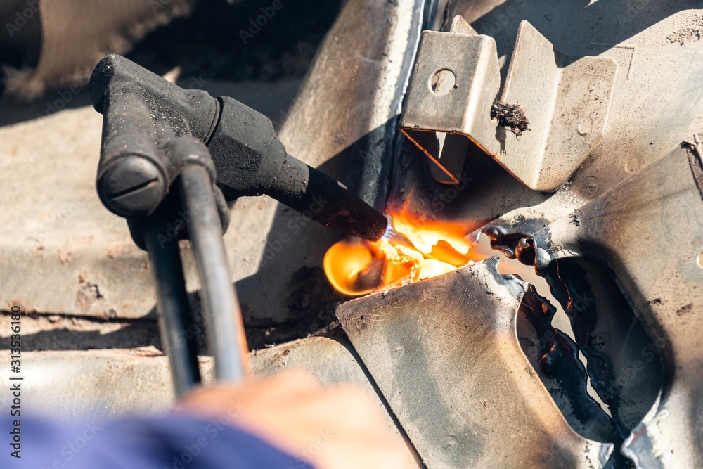 Oxy-Fuel Cutting Torch to cutting car for metal recycling Stock Photo ...