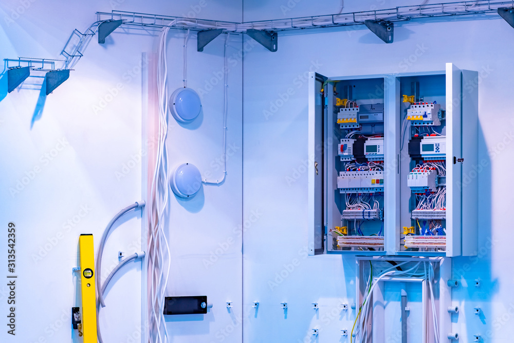 Installation of the electric network at the enterprise. Electric shield ...