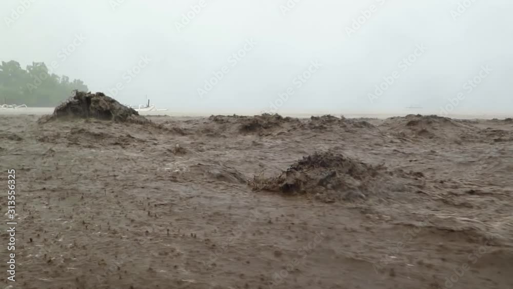 Flood. The rainy season in Bali. Environmental pollution. River and ...