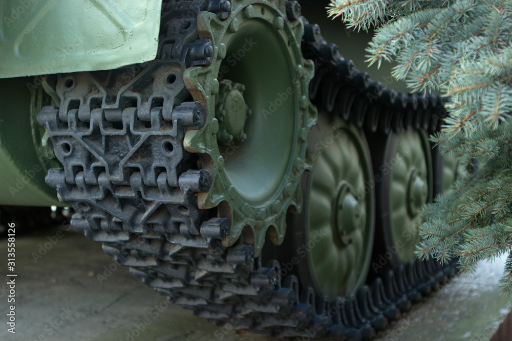 tracks of a tank fighting vehicle or an armored personnel carrier. The ...