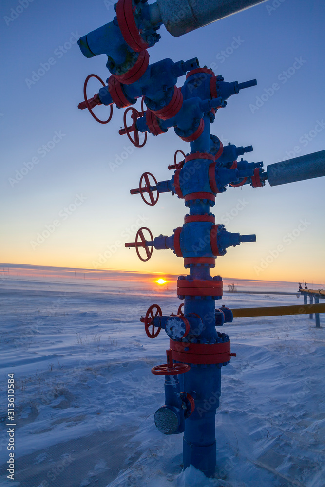 Oil, gas industry. Group wellheads and valve armature ,Gas well of high ...