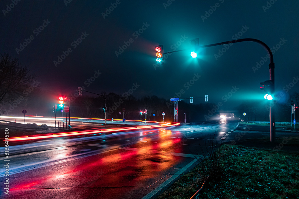 traffic lights in the city at night Stock Photo | Adobe Stock