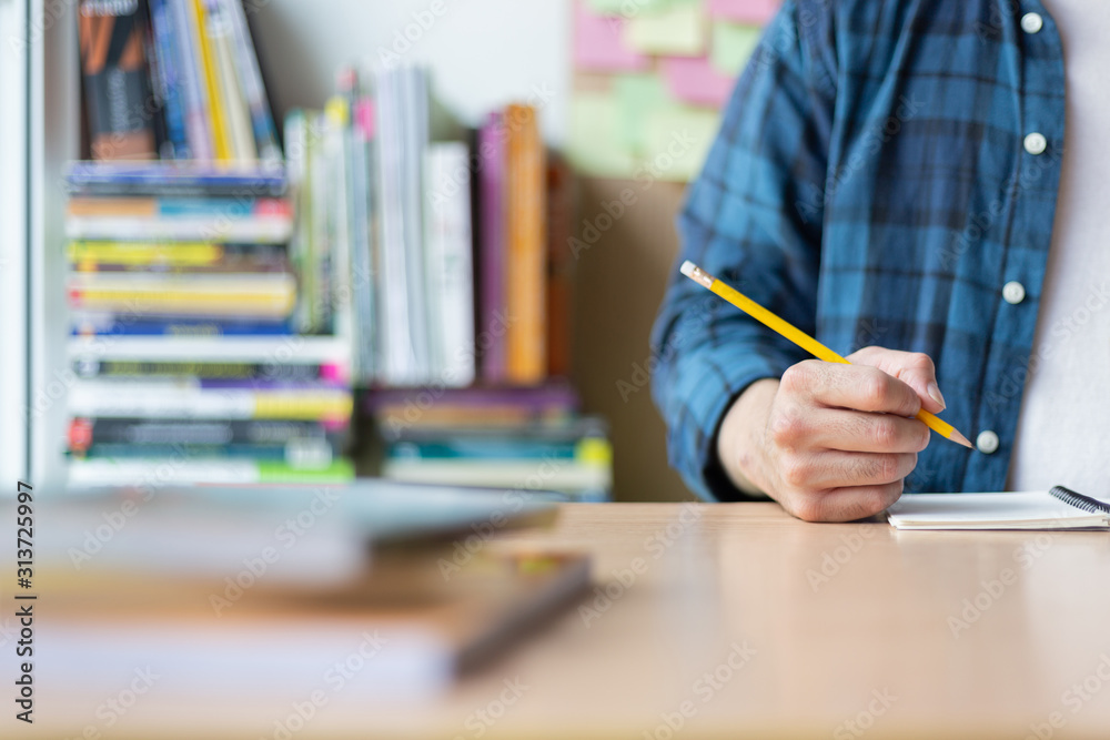high school,university student study.hands holding pencil writing paper ...