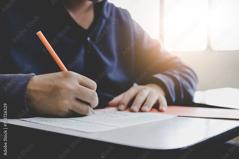 high school,university student study.hands holding pencil writing paper ...