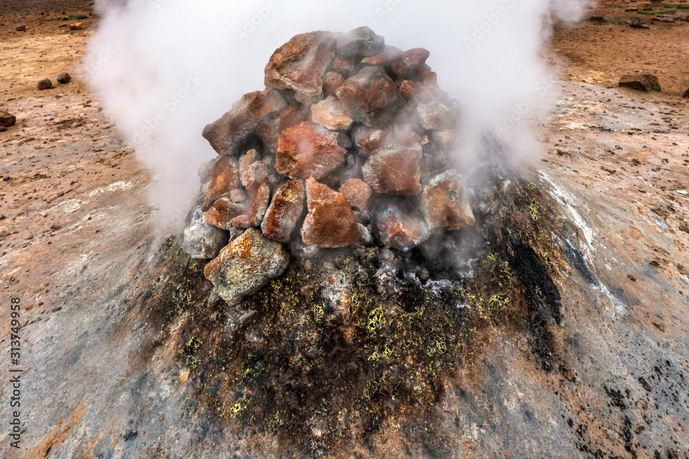 Hot sulfuric steam vent spewing sulphur steam in the hot sulfuric and ...