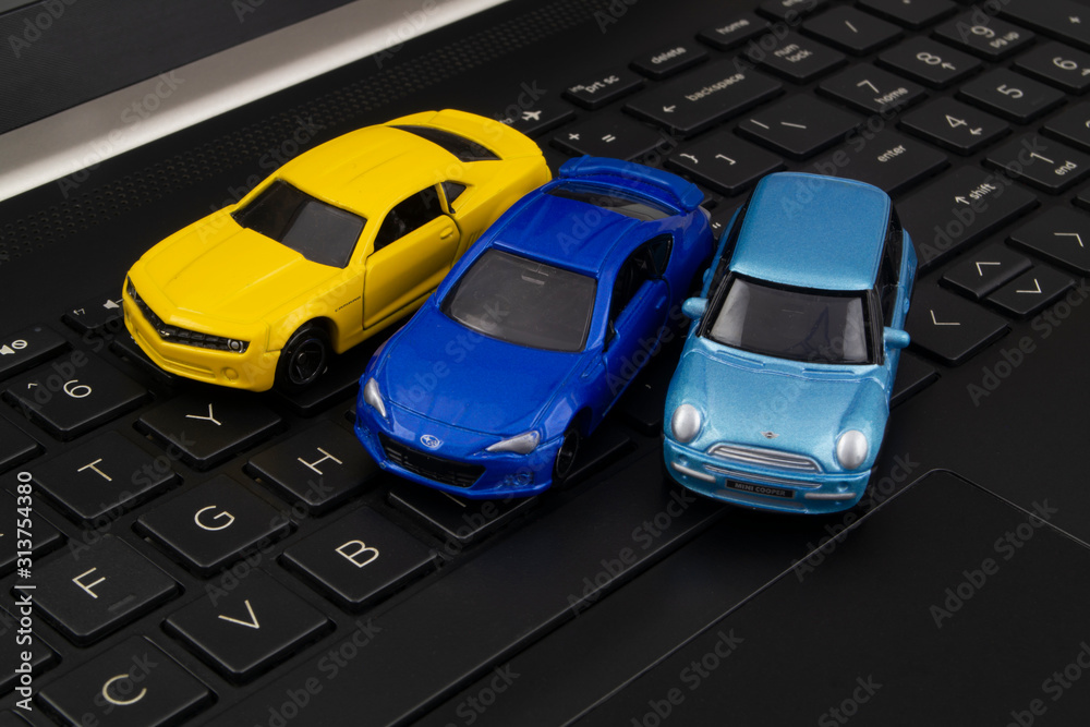 HO CHI MINH CITY, VIETNAM - JANUARY 05, 2020: Cars model on laptop ...