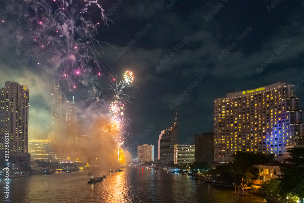 Celebration of New year day with colorful fireworks on Chao Phraya ...