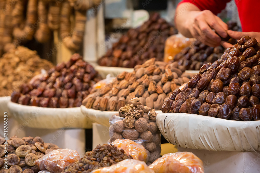 Dates, dry fruits from a moroccan market shop in the Medina of Fes ...
