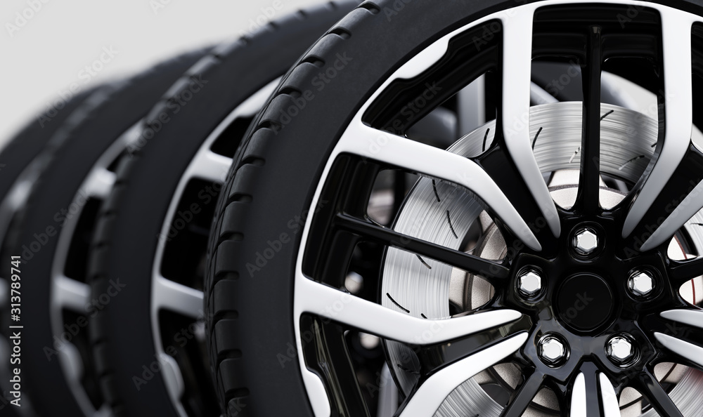 Set of wheels with modern alu rims close-up on white Stock Photo ...