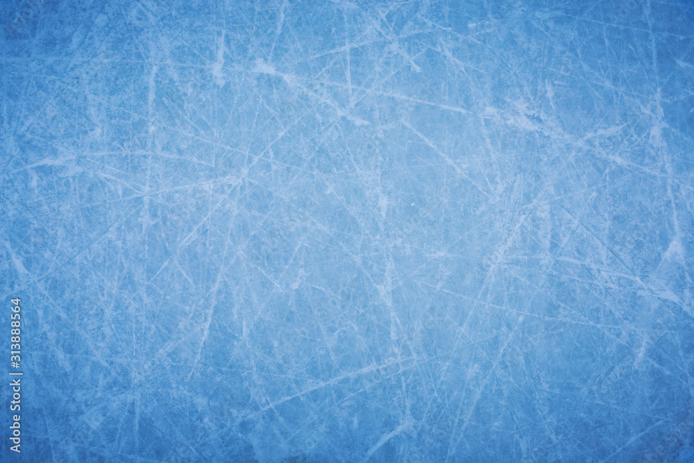 Ice background with marks from skating and hockey, blue texture of rink ...